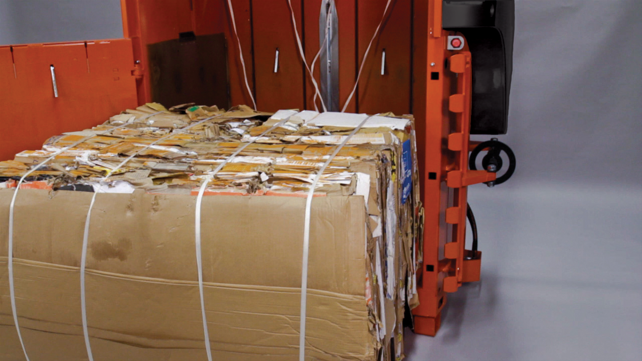 Orwak Power baler with bale_black - Orwak